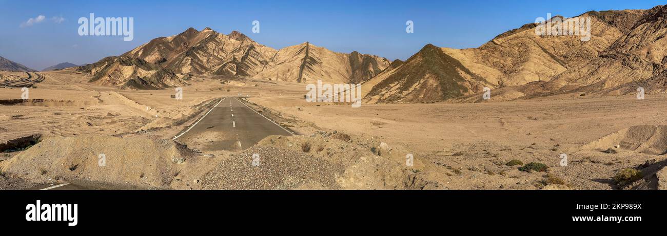 Old blocked road, desert sand and mountain ridge, Dahab, Sinai, Egypt ...