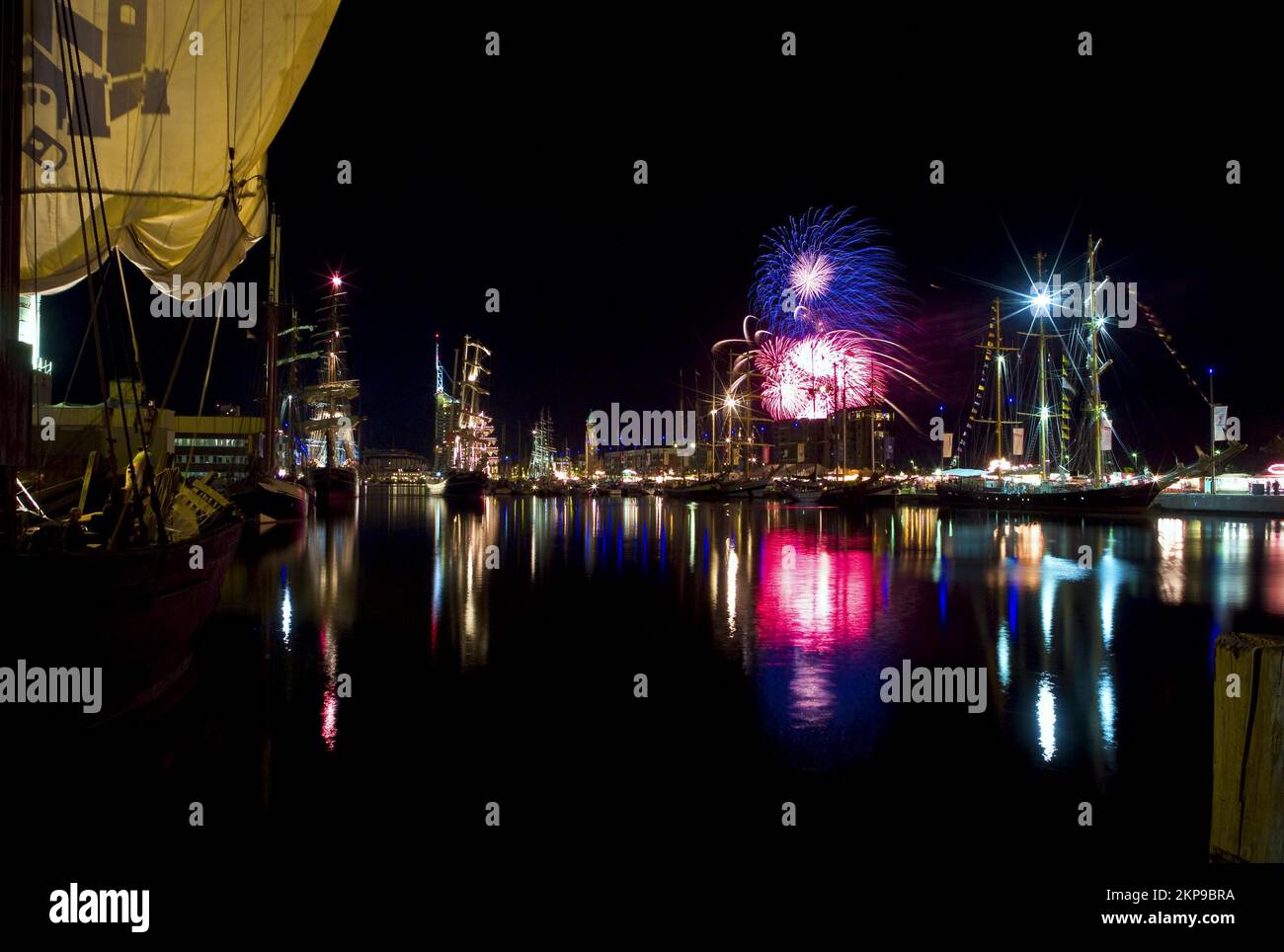 Tall ship at night in the harbour with fireworks, Bremerhaven, Germany ...