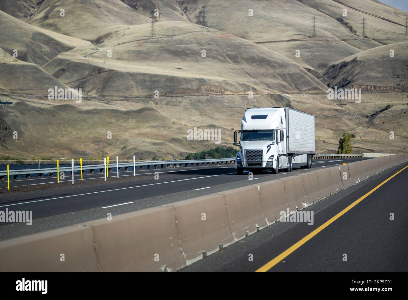 Industrial white big rig high cab long haul semi truck tractor ...