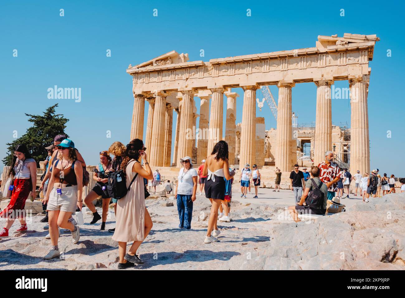 Athens, Greece - August 30, 2022: A crowd of visitors by the Acropolis ...