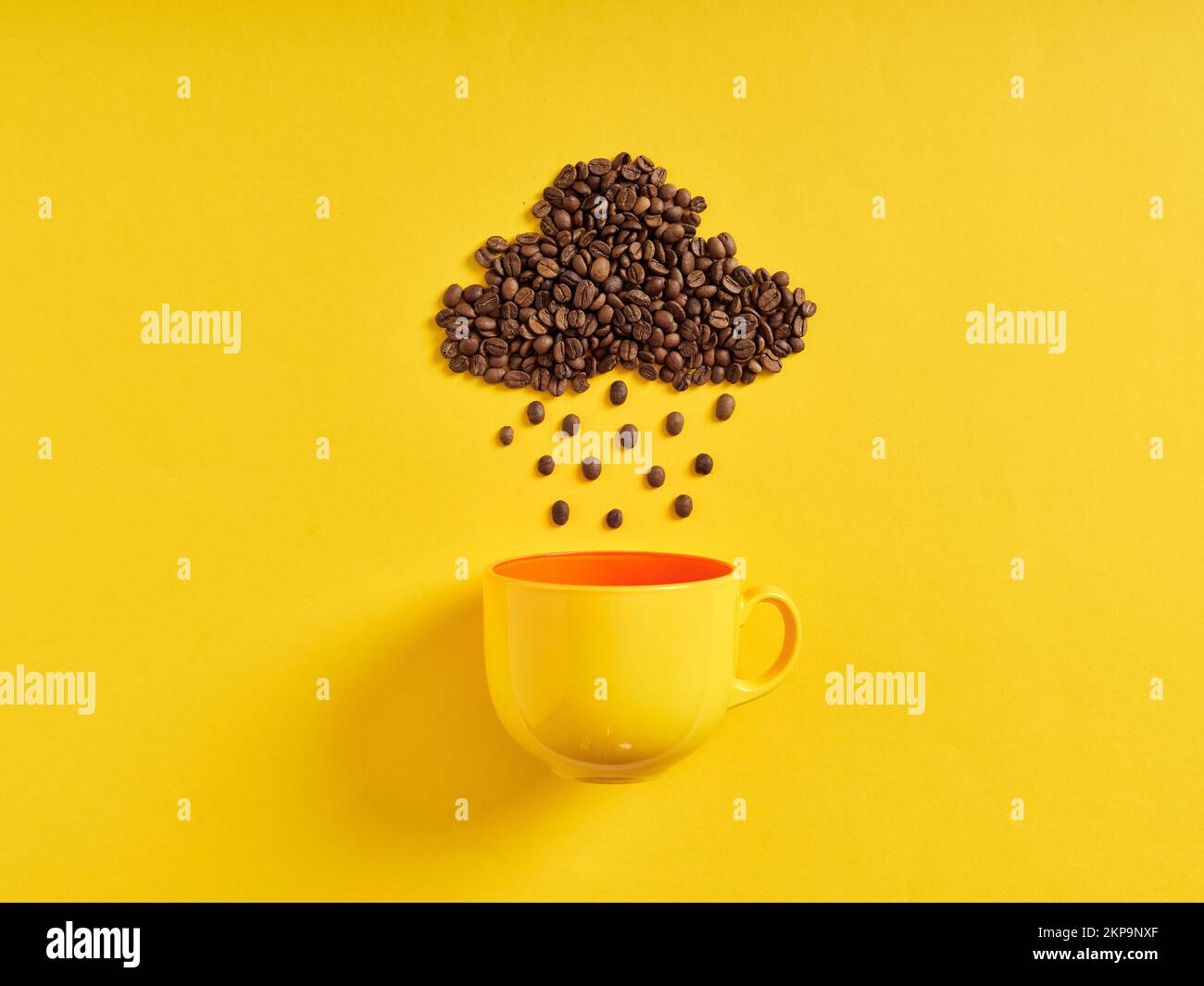 Raining coffee concept. Coffee beans in shape of rain cloud and ...