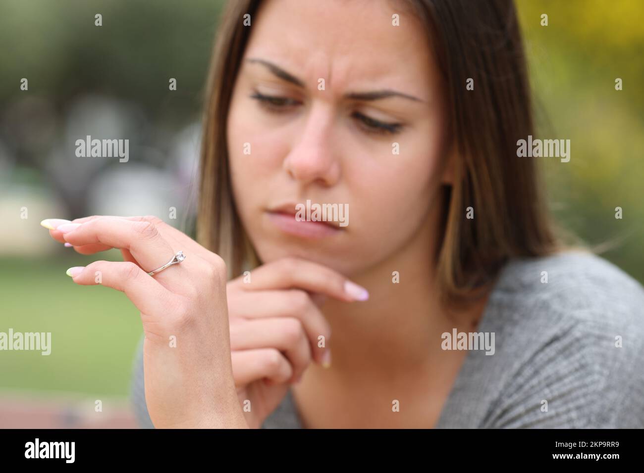 Doubtful woman engagement hi-res stock photography and images - Alamy