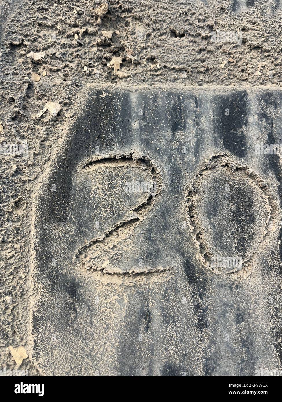 Number 20 on the gray wall of the house Stock Photo - Alamy