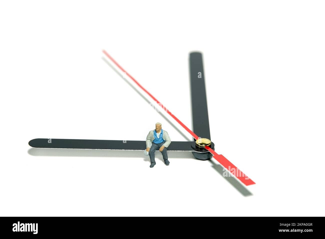 Miniature people toy figure photography. A men worker take a break rest ...