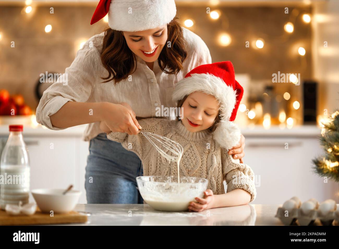 Merry Christmas and Happy Holidays. Family preparation holiday food ...