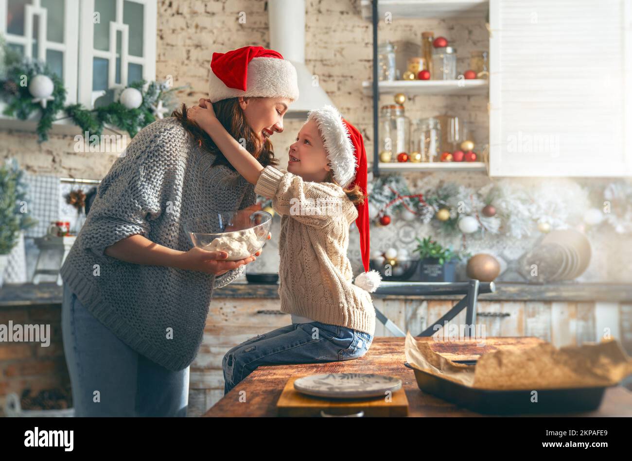 Merry Christmas and Happy Holidays. Family preparation holiday food ...