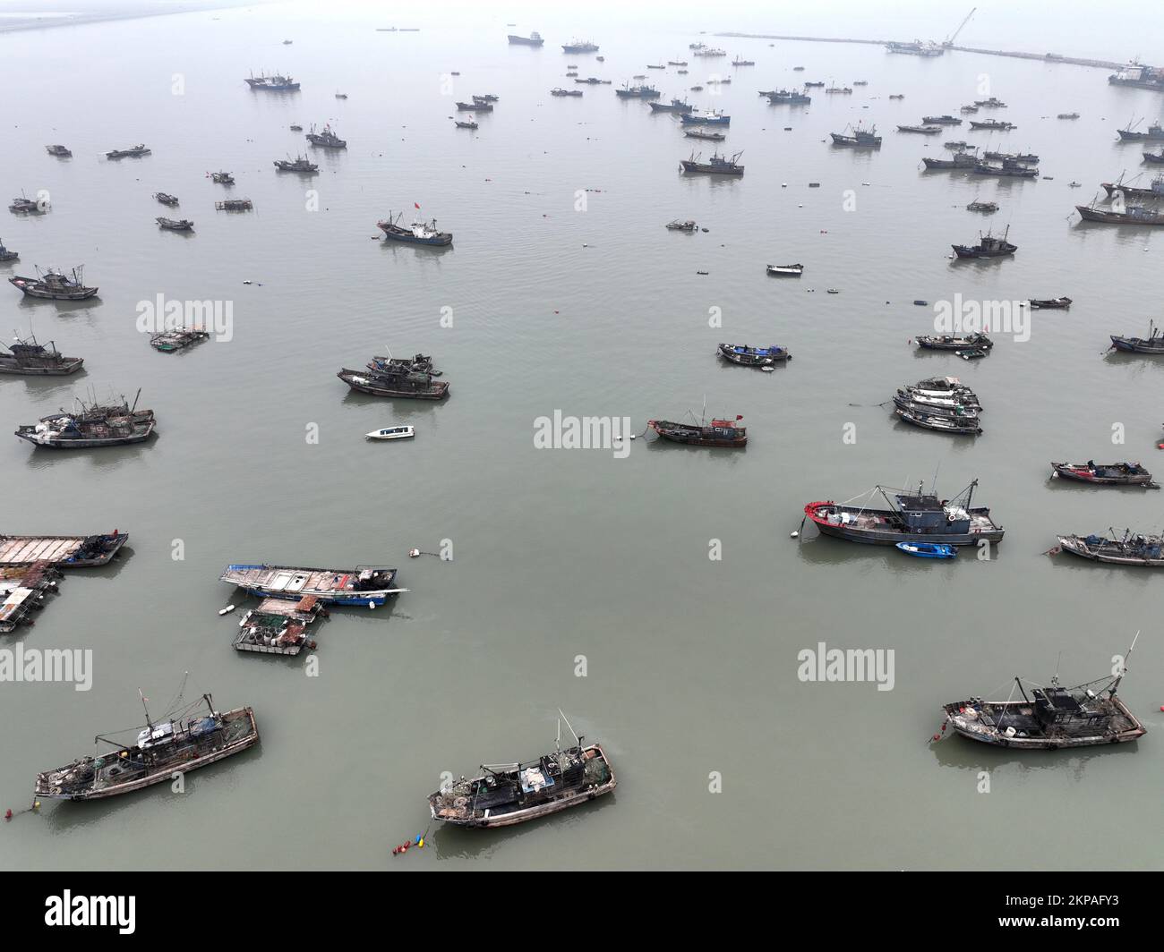 Thousands of fishing boats stay in the port to escape the stormy ...