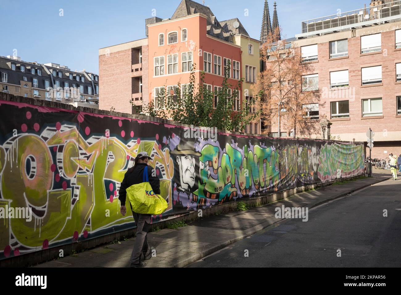 graffiti on a building fence on Steinweg in the historic town, Cologne ...