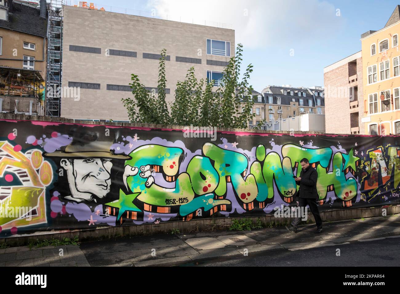 graffiti on a building fence on Steinweg in the historic town, Cologne ...