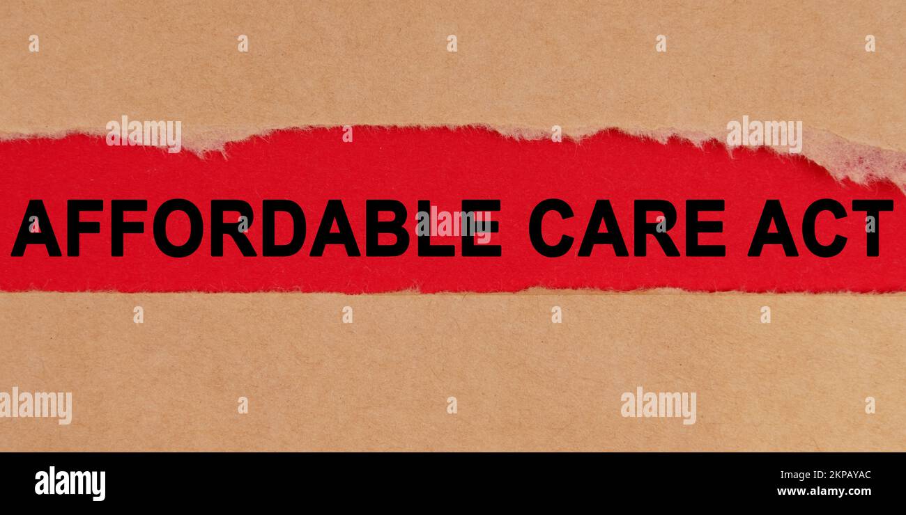 Law concept. Among the torn sheets of paper on a red background, the ...