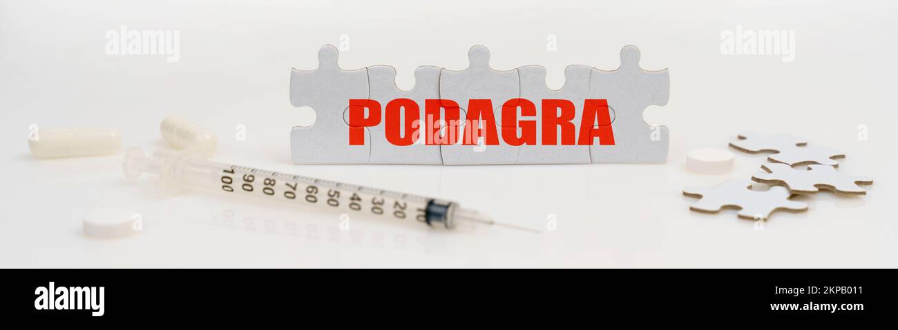 Medicine and health concept. On a white background lie a syringe, pills ...