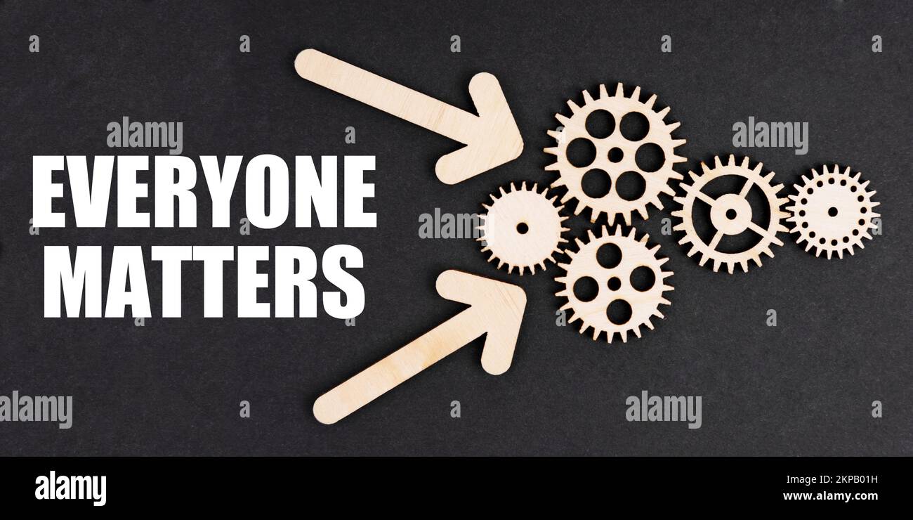 Business and finance concept. On the black surface, arrows, gears and ...