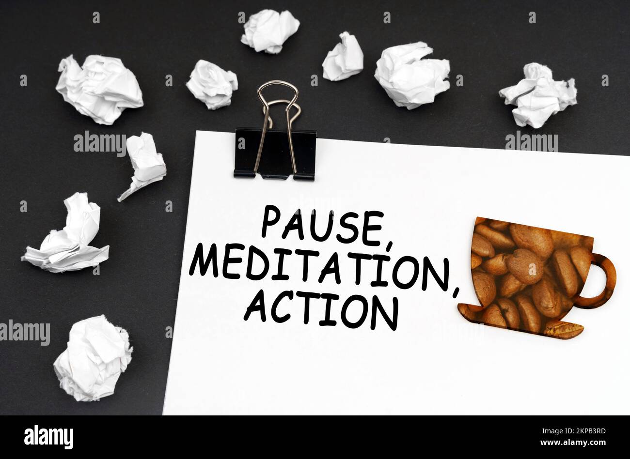 Rest at work. On the black surface is a white sheet with the ...