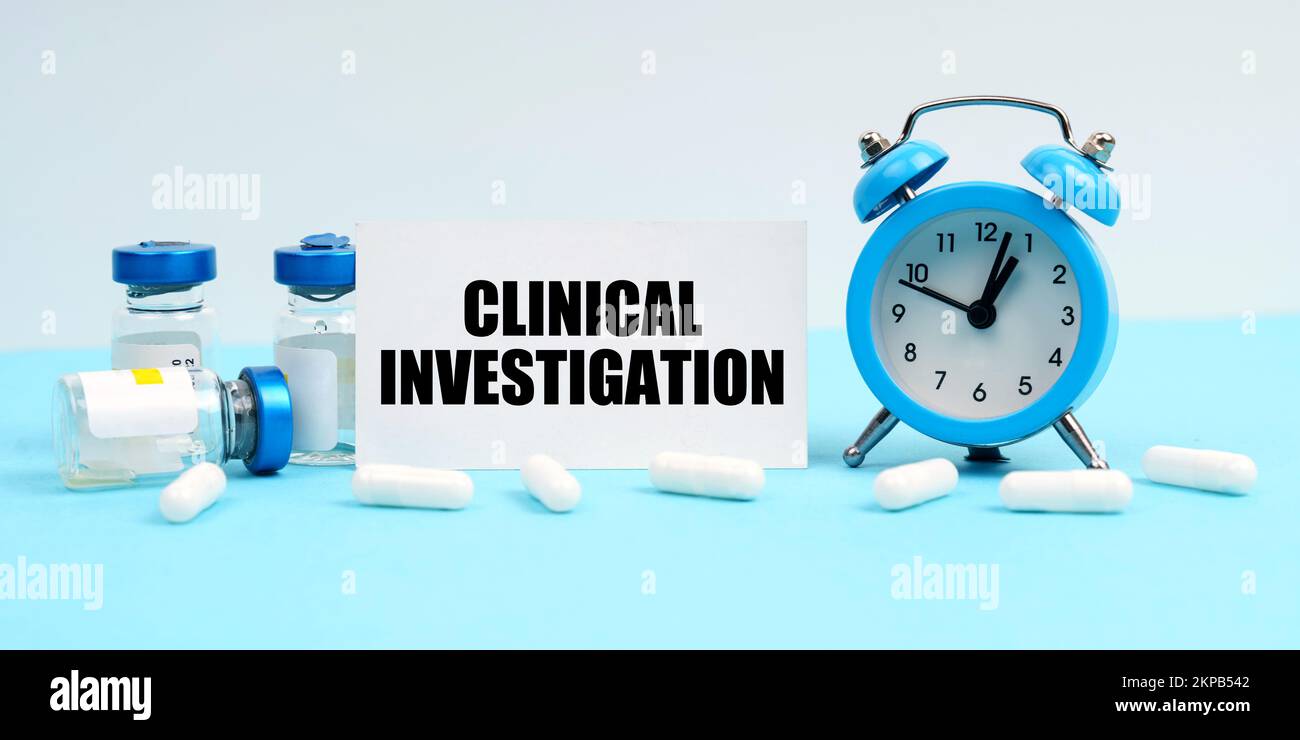 Medicine and health concept. An alarm clock, pills, injections and a ...