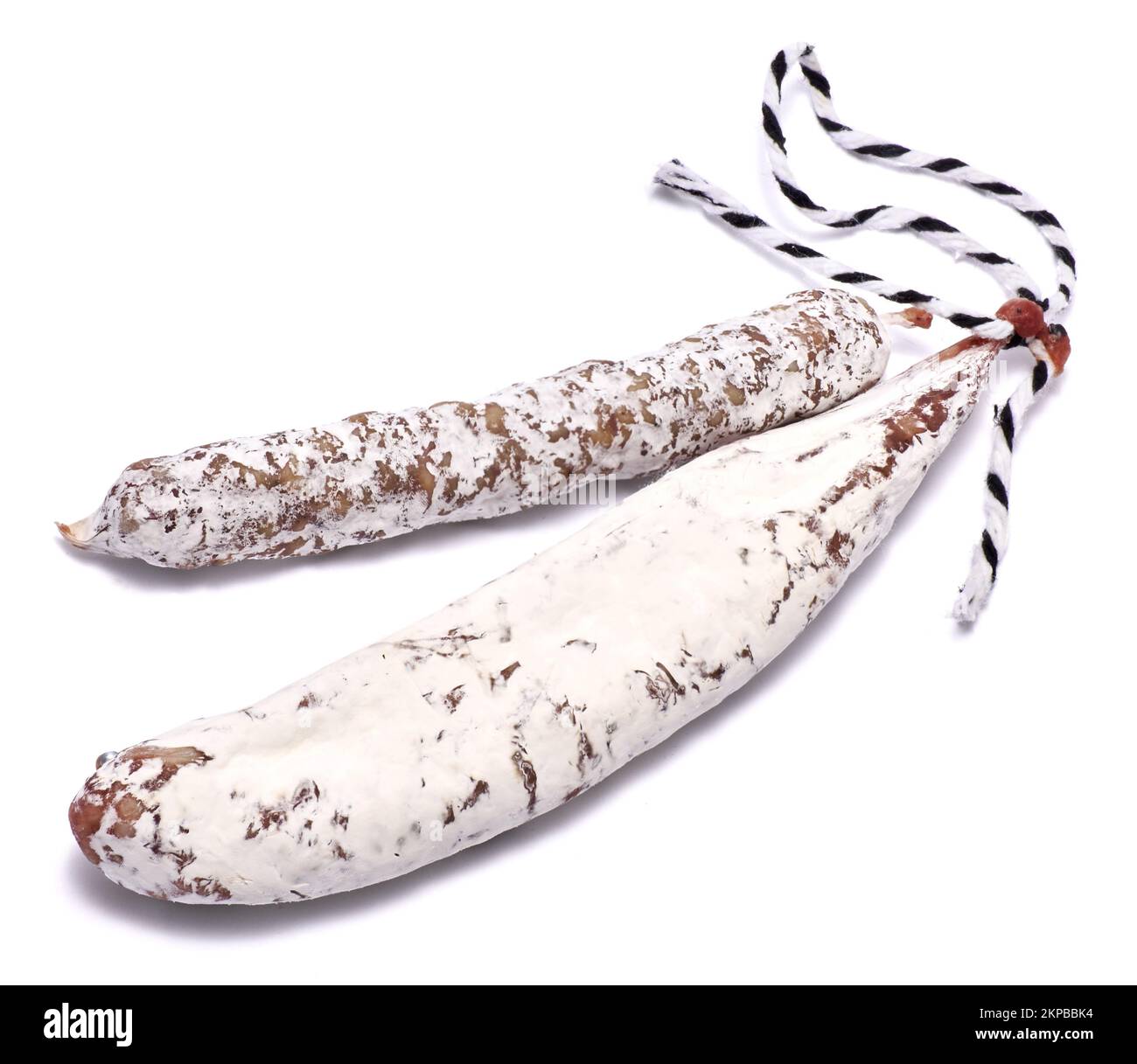 Spanish Fuet thin dried salami sausage isolated on a white background ...