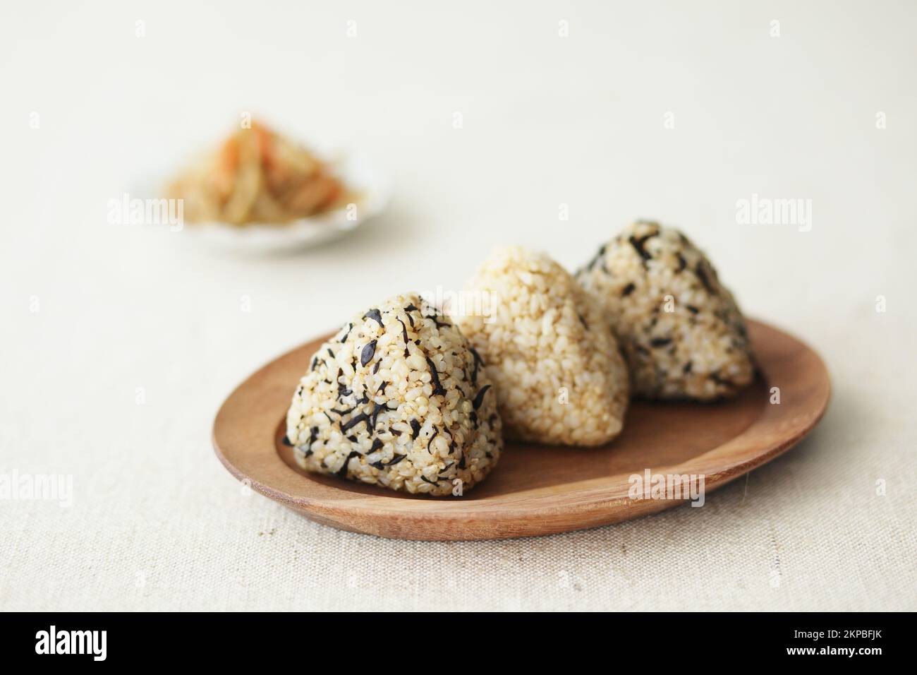 Brown rice and seaweed rice balls Stock Photo - Alamy