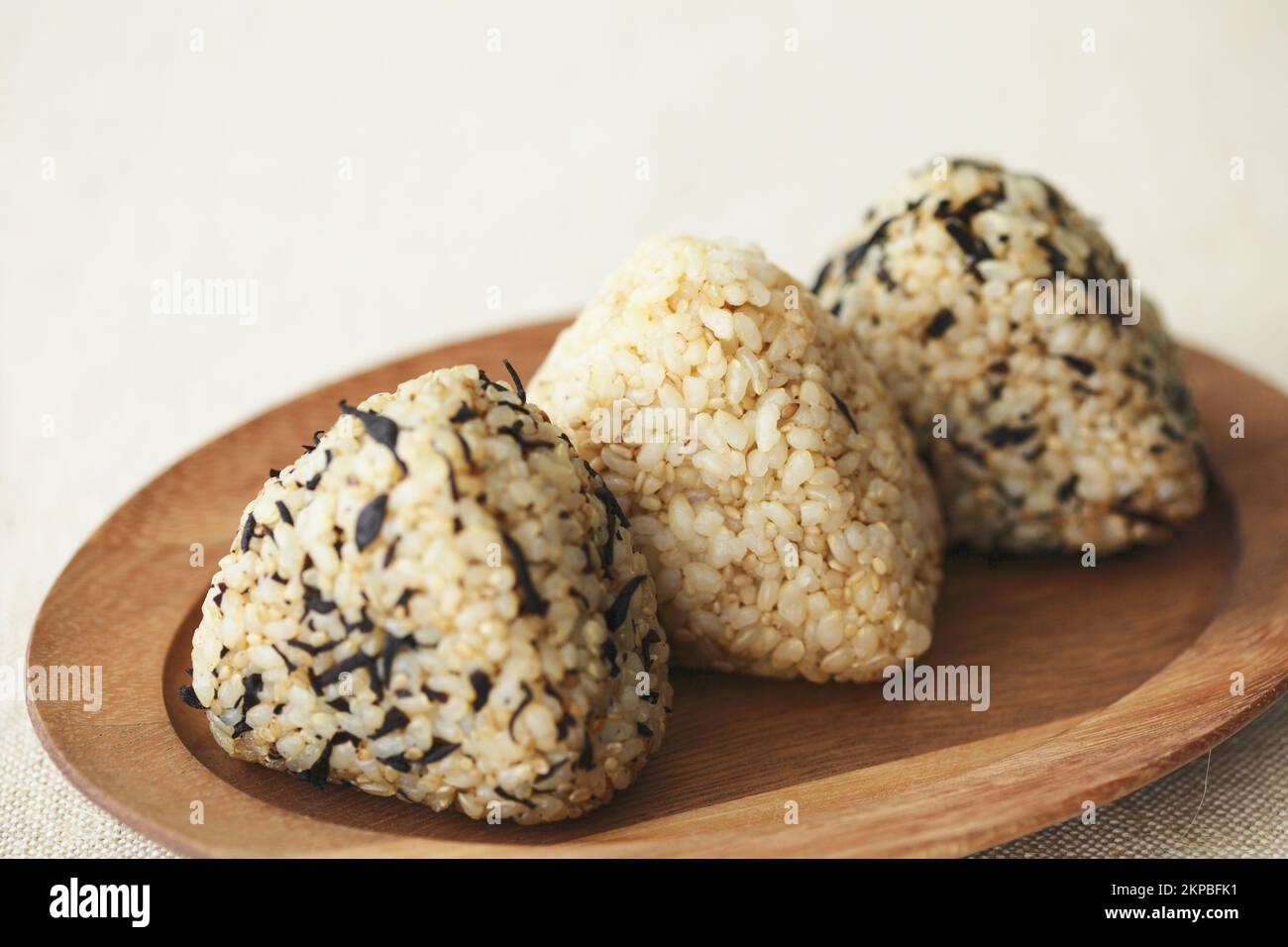 Brown rice and seaweed rice balls Stock Photo - Alamy