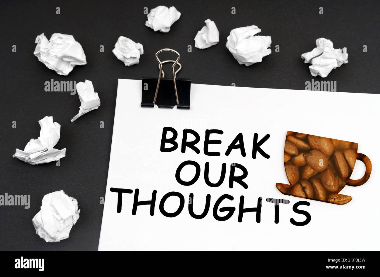 Rest at work. On the black surface is a white sheet with the ...