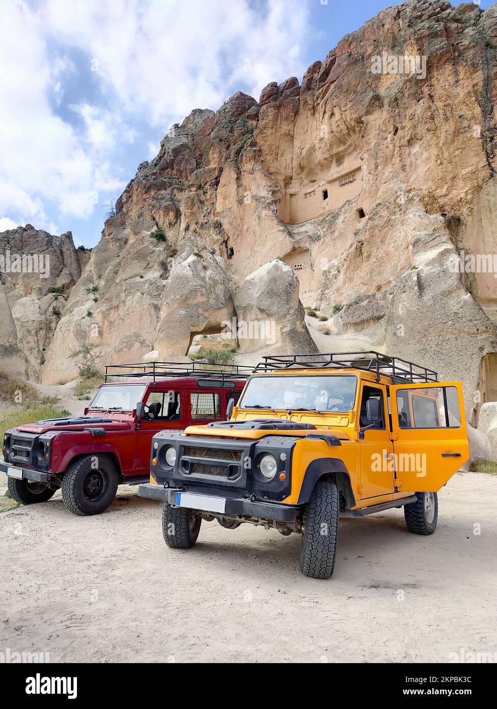 Two 4x4 SUV (Sports Utility Vehicle) parked in front of monument in ...