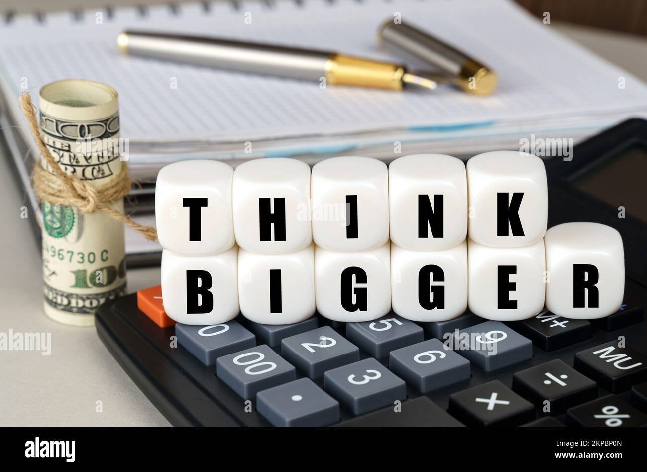 Business and finance concept. On the table is a calculator, dollars, a ...