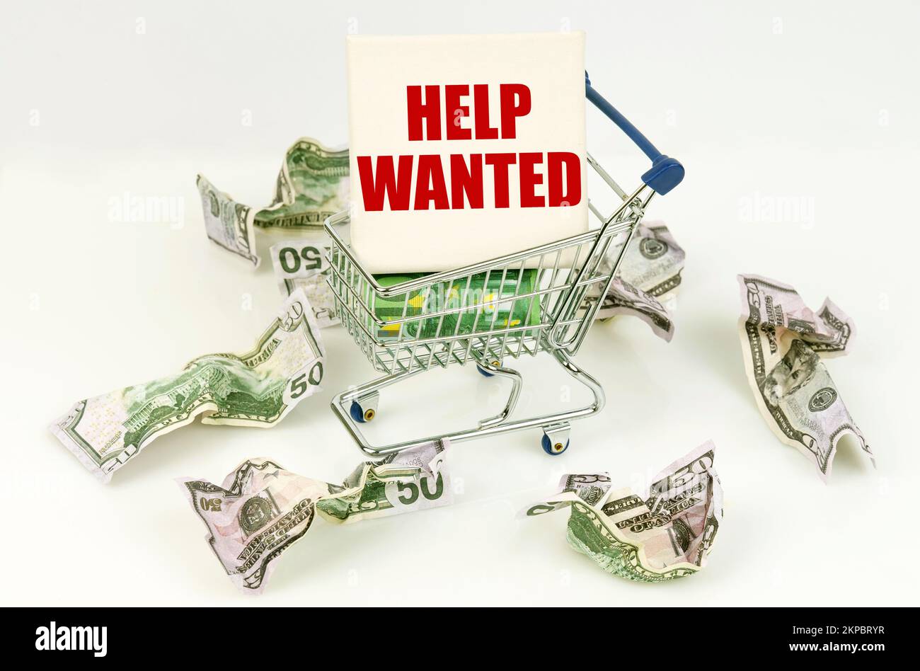 Business and economy concept. Crumpled dollars lie on a white surface ...