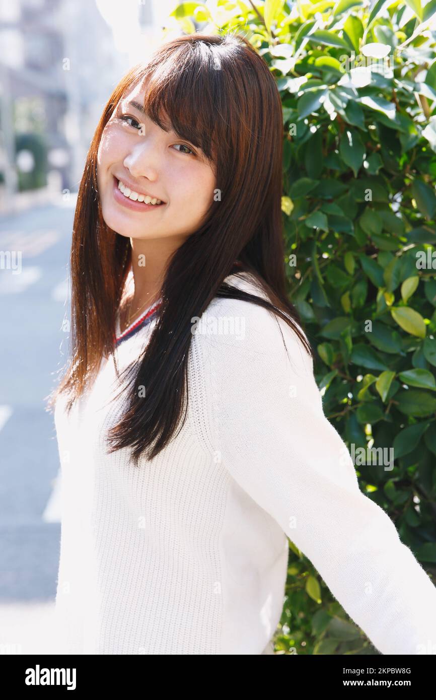 Japanese woman with a smile Stock Photo - Alamy