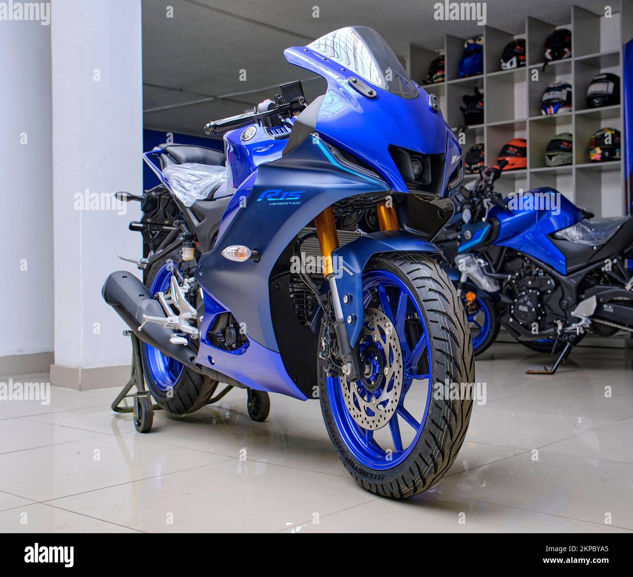 Motorcycles in the showroom Yamaha shop. Yamaha R15 v4 motorcycle ...