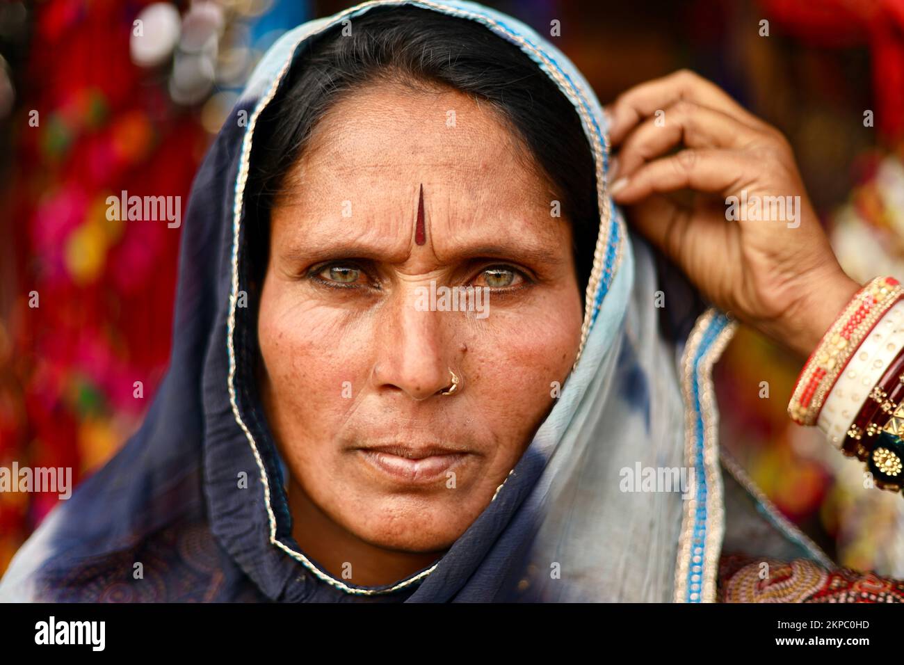 An Indian old kalbelia tribal woman. This snake charming tribe used to ...