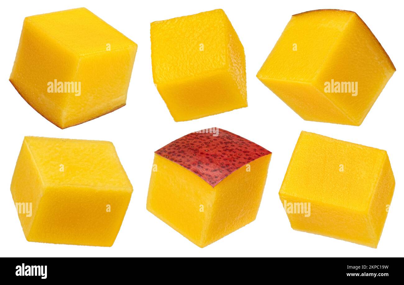 Mango cube slices isolated on white background Stock Photo - Alamy