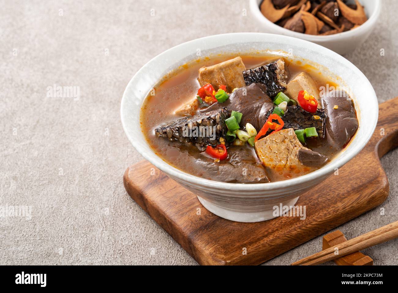 Delicious spicy duck blood jelly soup bowl and stinky tofu with ...