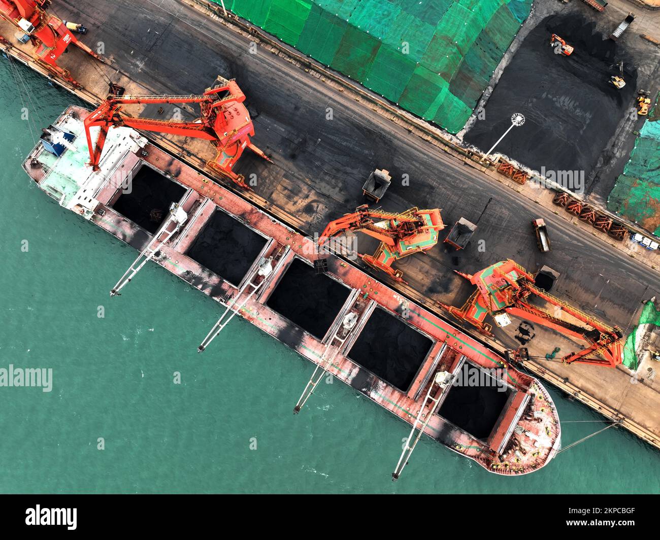 Aerial photo shows the cargo ships unloading the thermal coal at the ...