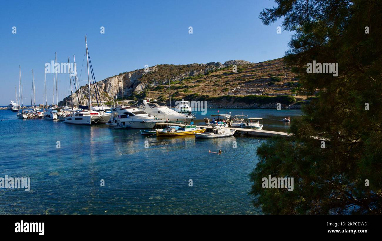 Southwestern tip of Turkey. Sunset from the ancient city of Datca Knidos. Yazikoy village harbor ...