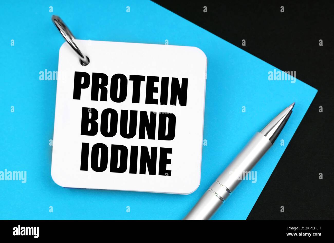 Medicine and health concept. On the black surface lies blue paper, a ...