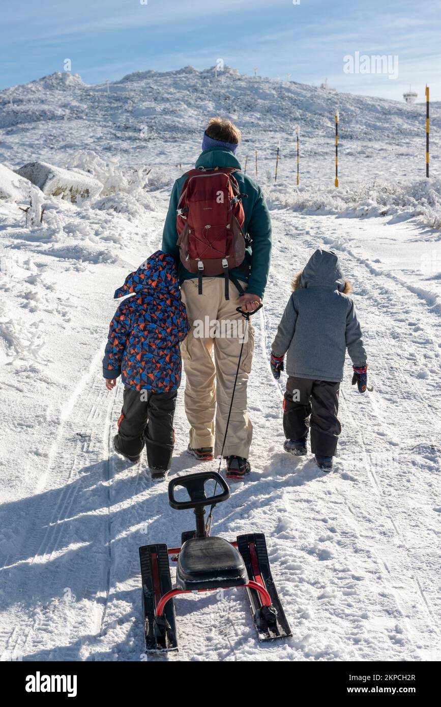 Father and two children on a hiking trail to the Black Peak Summit at ...