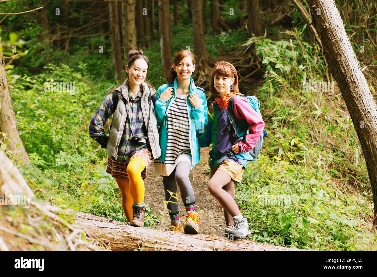 Three girls hiking in the mountains Stock Photo - Alamy