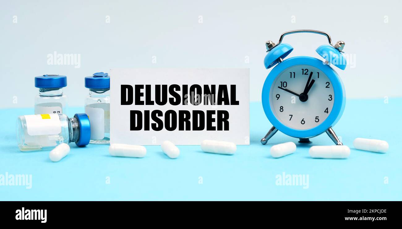 Medicine and health concept. An alarm clock, pills, injections and a ...