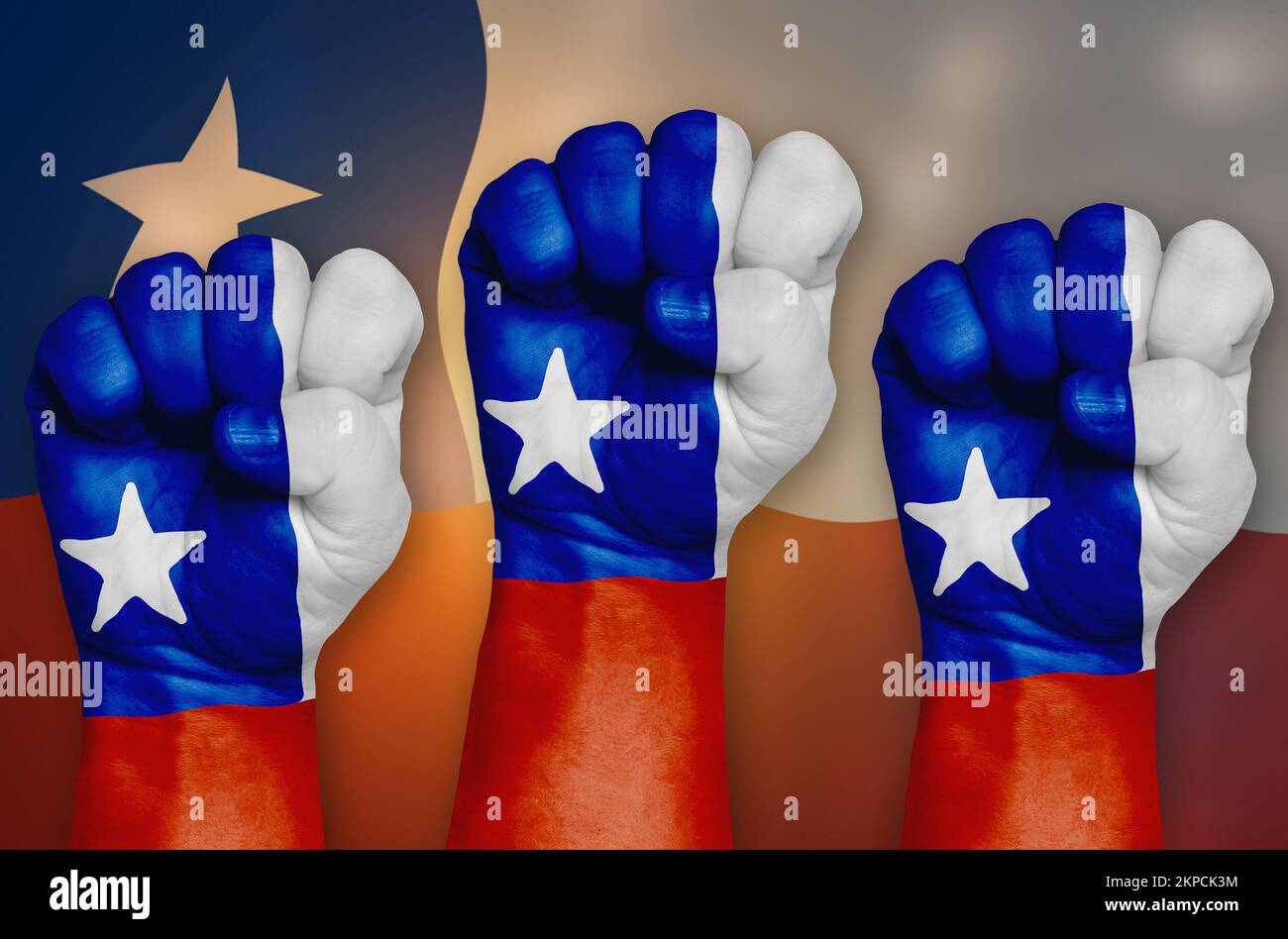 The Chile flag is drawn on a clenched fist and in the background. The ...
