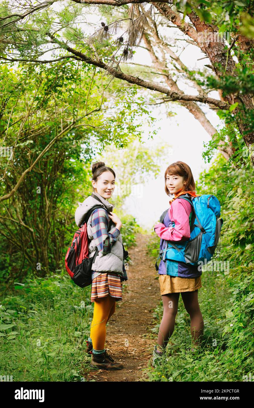 Two women hiking rear view fall hi-res stock photography and images - Alamy