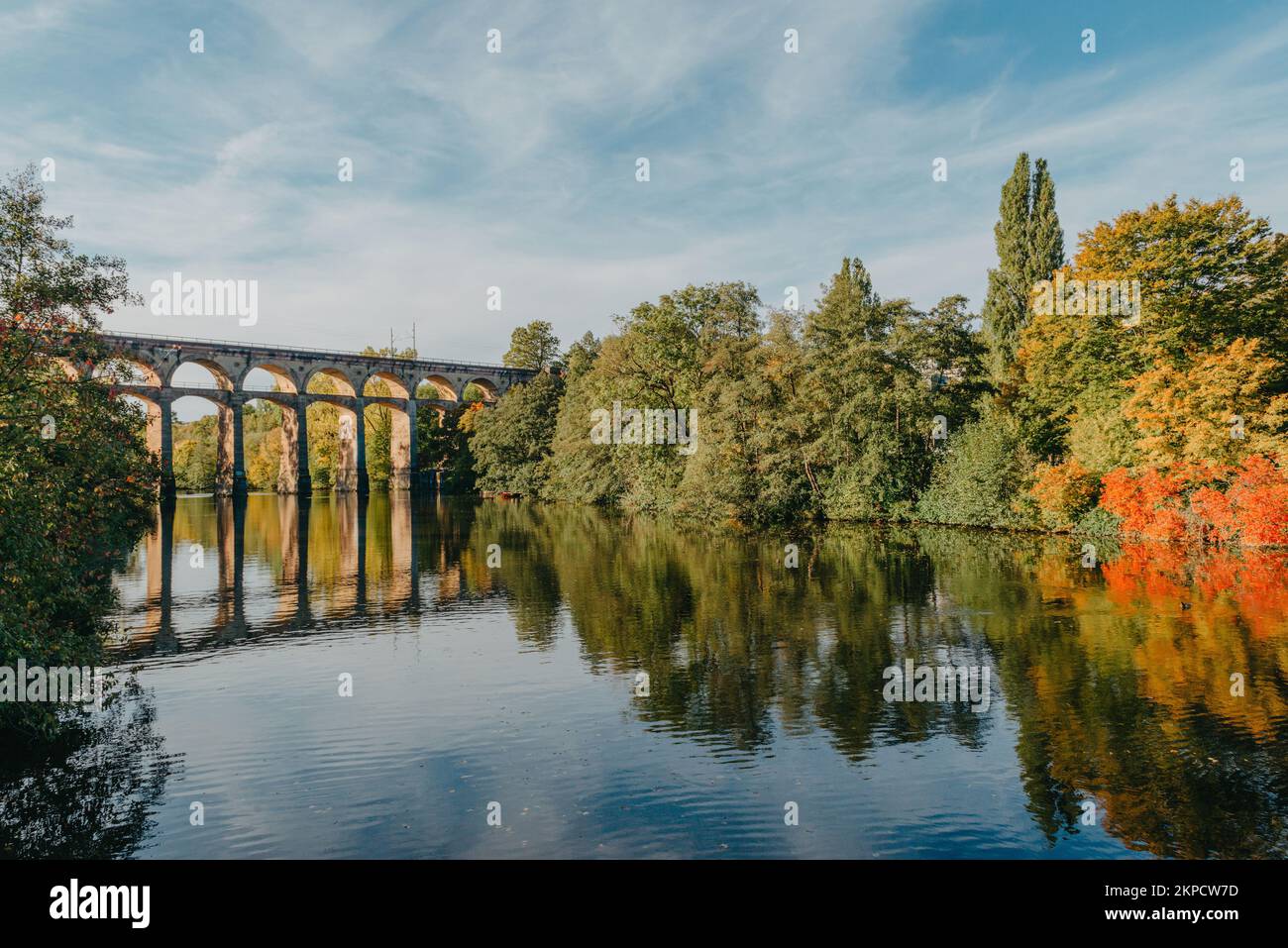 Germany train passing train bridge on cloudy day in germany hi-res ...