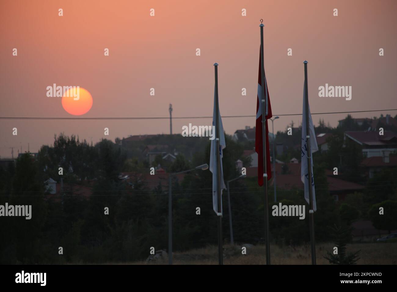 Beautiful golden sunset flag flying hi-res stock photography and images ...