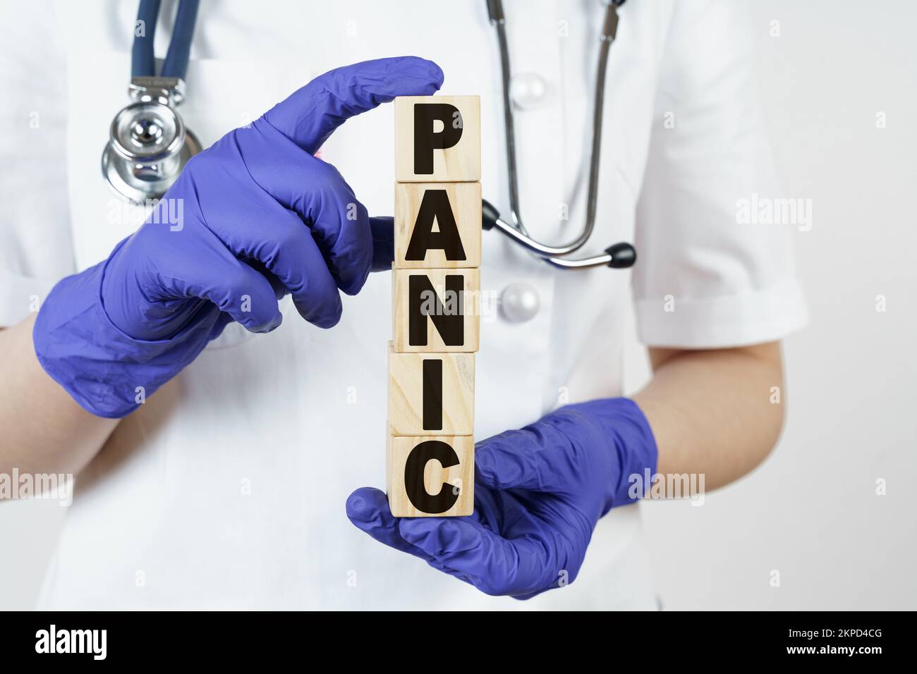 Medicine and health concept. The doctor holds cubes in his hands on ...