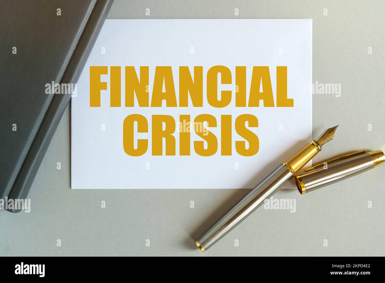 Business and finance concept. On the table are a notebook, a pen and a ...