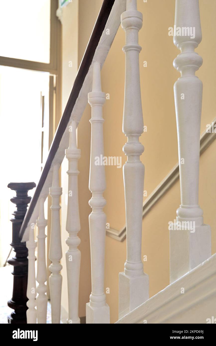 Stair balusters and white wooden carved Stair spindles Stock Photo - Alamy