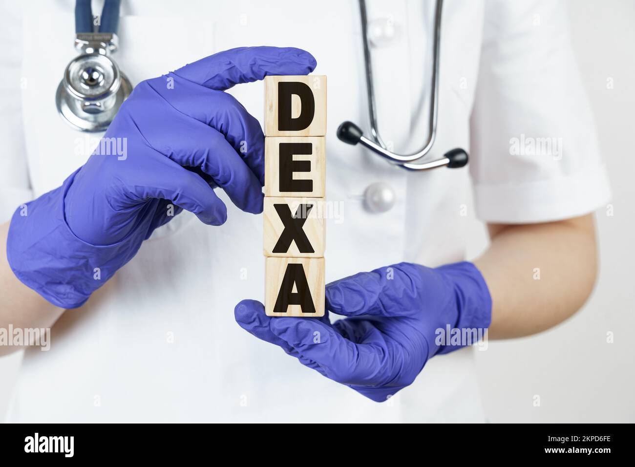 Medicine and health concept. The doctor holds cubes in his hands on ...