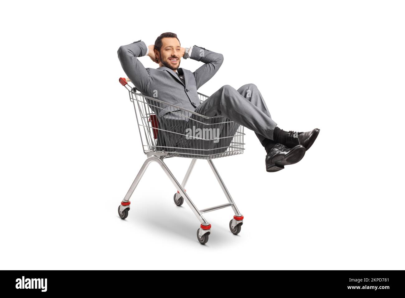 Businessman sitting and resting inside a shopping cart isolated on ...