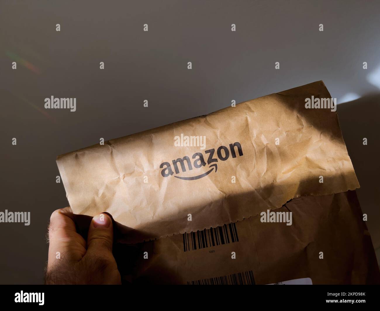 Paris, France - Oct 4, 2022: POV male hand holding Amazon prime ...