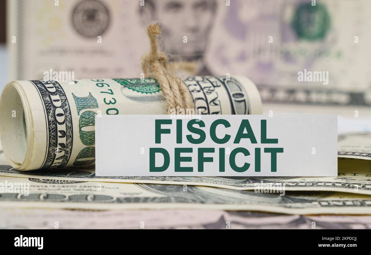 Finance and economics concept. On the table are bills, a bundle of ...