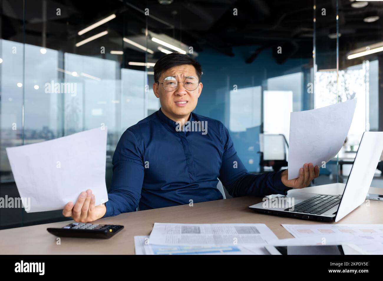 Portrait upset and disappointed Asian man, financier accountant doing ...