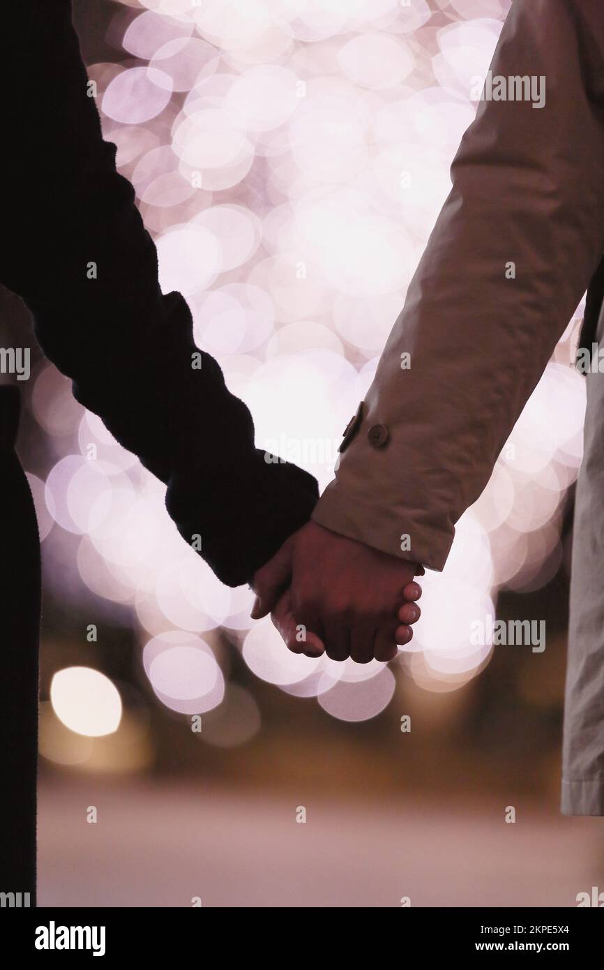 Couple silhouette hand rear view hi-res stock photography and images ...