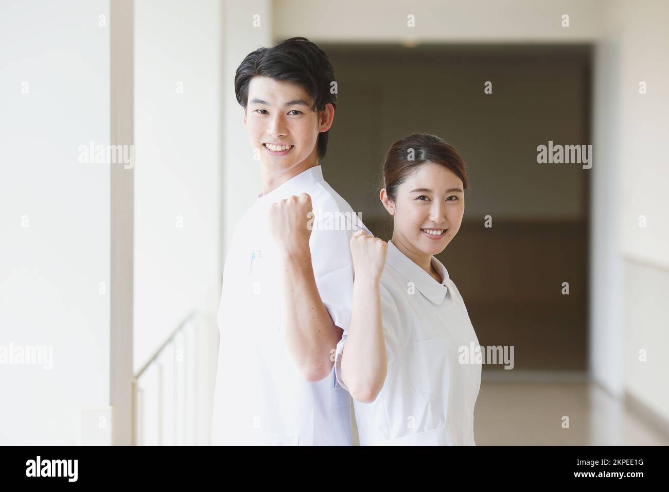 Smiling young Japanese nurses posing in the hallway Stock Photo - Alamy